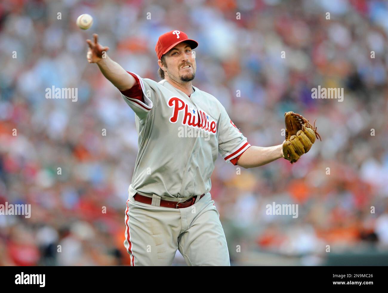 Philadelphia Phillies relief pitcher Chad Qualls (50) throws to first ...