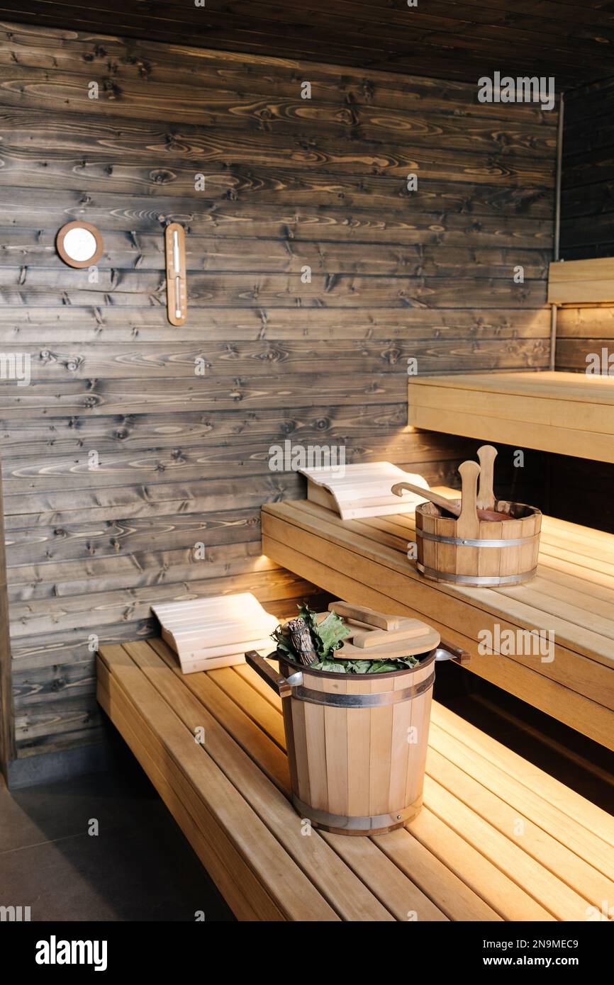 Modern interior of wooden spa cabin. View of empty Finnish sauna room ...