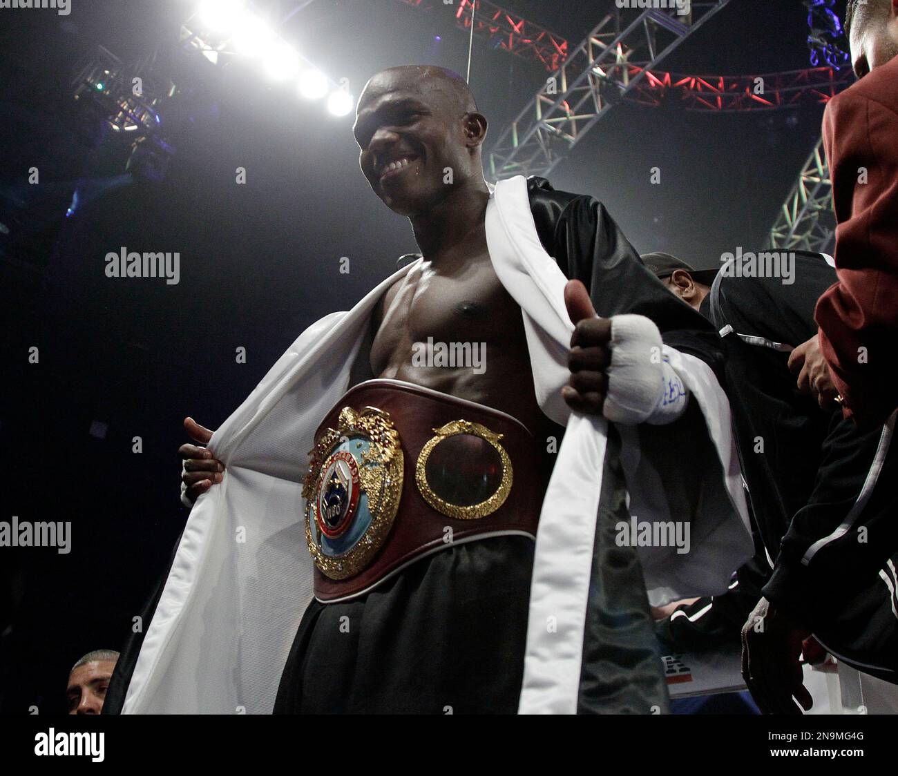 Timothy Bradley, from Palm Springs, Calif., shows off his champion's ...
