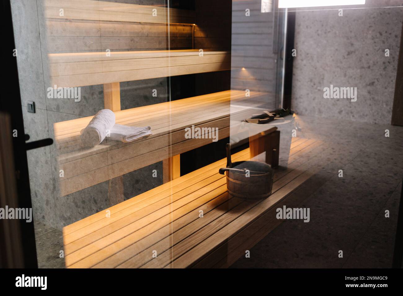 Finnish bathroom with a small wooden sauna. Modern spa interior. Photo ...