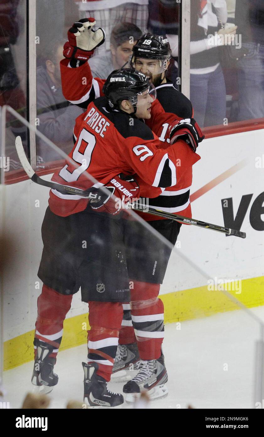 New Jersey Devils' Zach Parise celebrates with teammate Travis Zajac ...