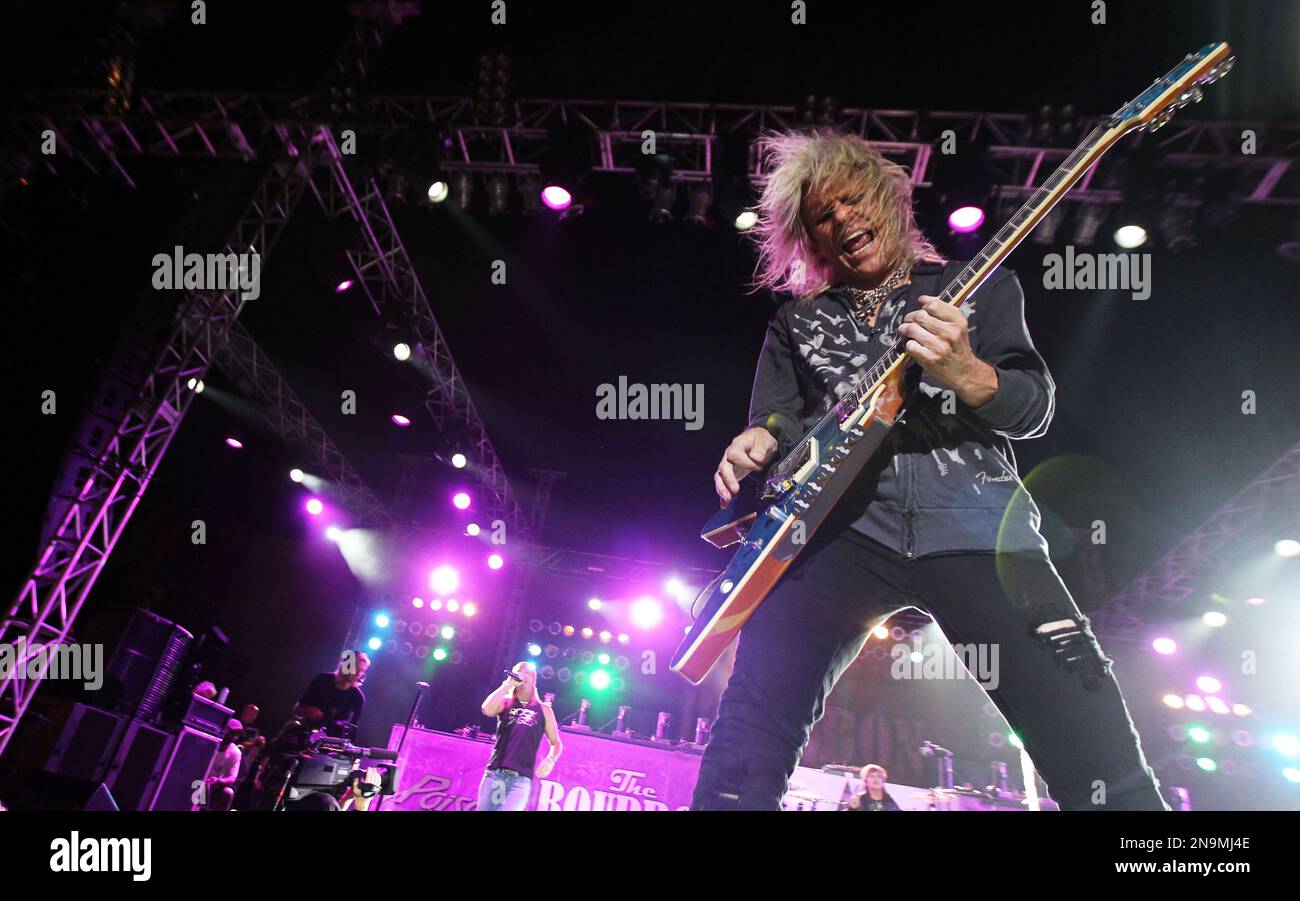 C.C. DeVille performs with the band Poison at the after party for the ...