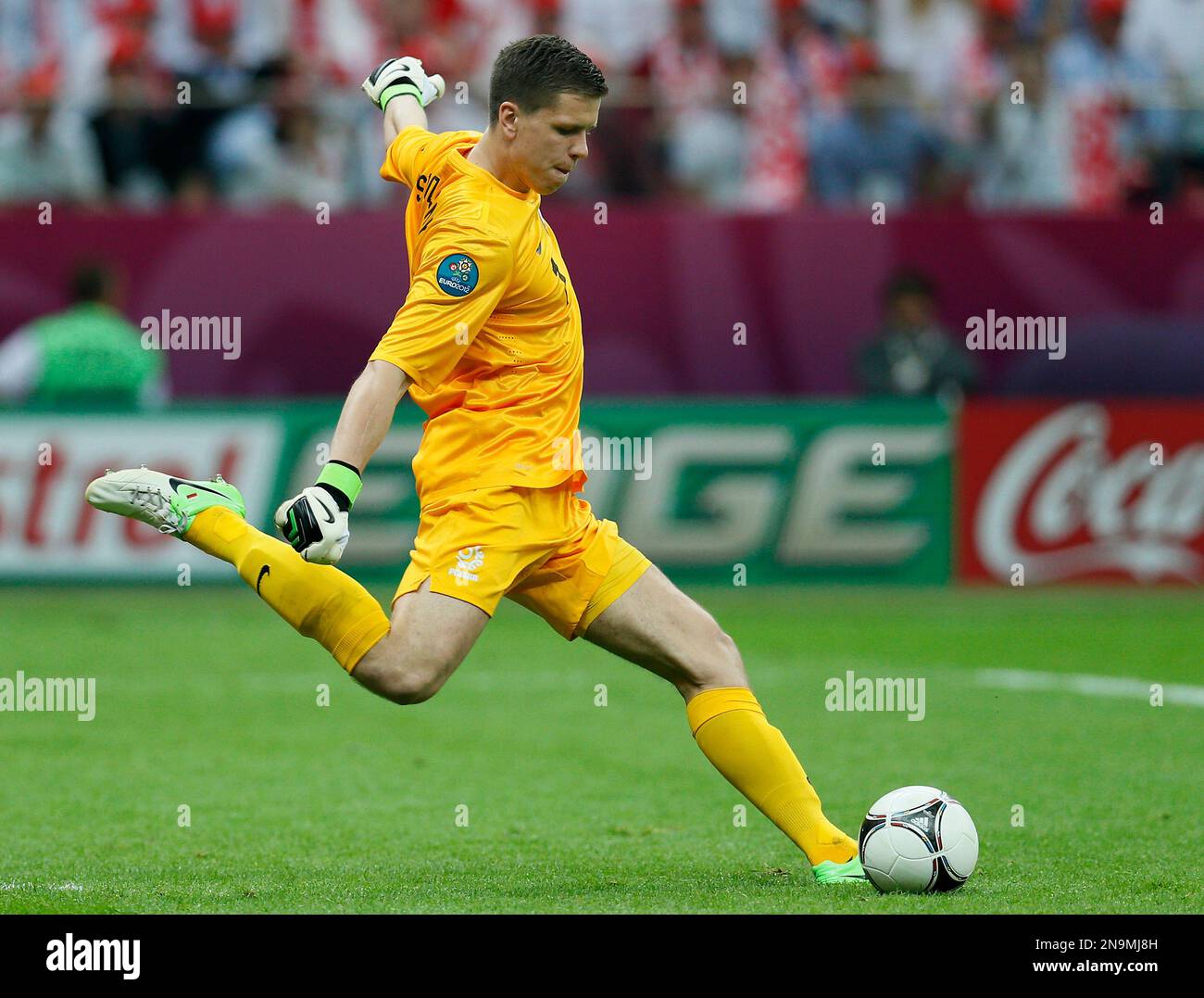Poland goalkeeper Wojciech Szczesny plays the ball during the Euro 2012 ...