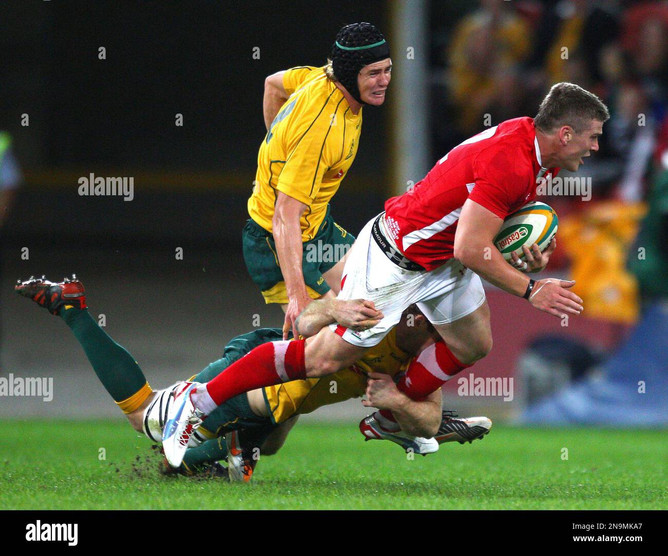 Wales' Scott Williams, right, is tackled by Australia's Adam Ashley ...