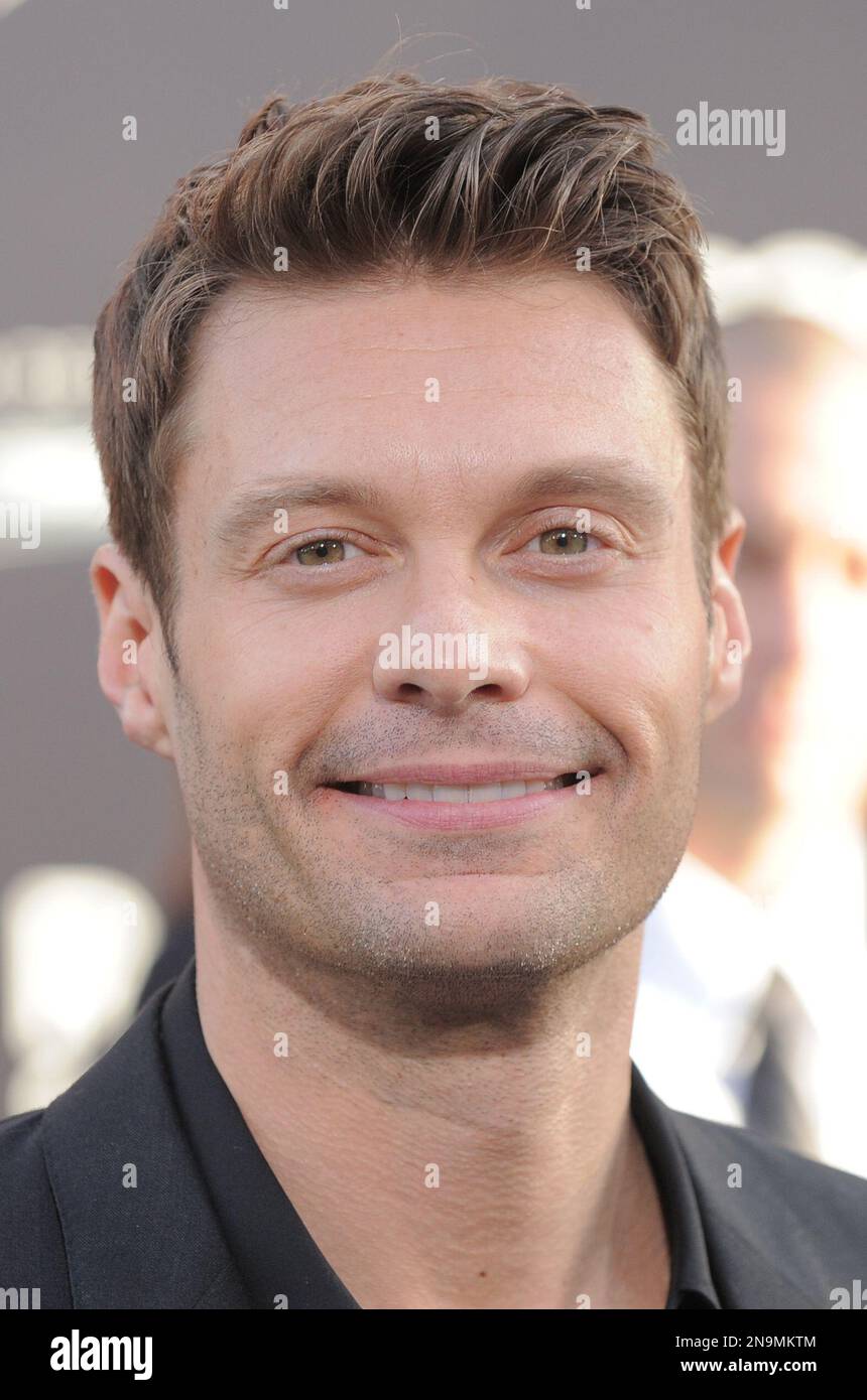 Ryan Seacrest arrives at the "Rock of Ages" premiere at Grauman's ...
