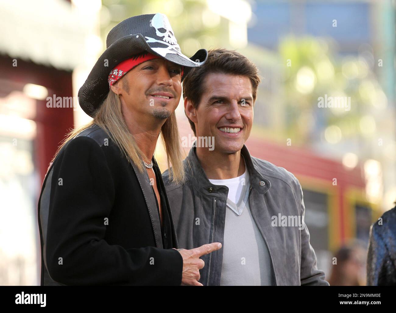 Bret Michaels, left, and Tom Cruise arrive at the "Rock of Ages ...