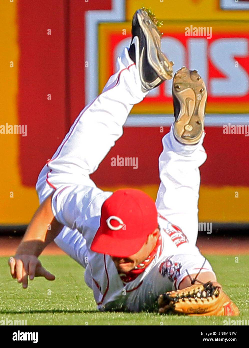 Cincinnati Reds center fielder Chris Heisey catches a line drive hit by ...