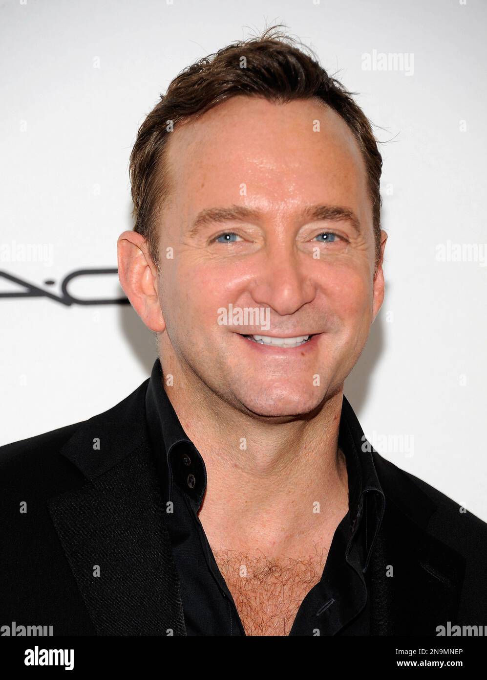 Television personality Clinton Kelly arrives at the amfAR Inspiration ...