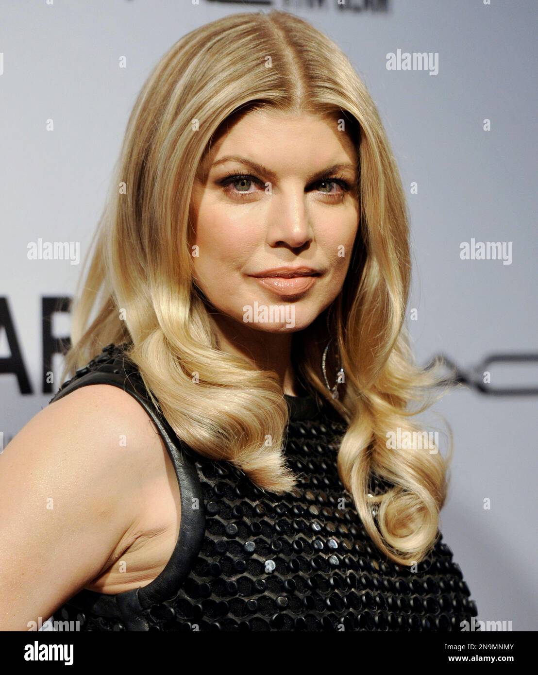 Singer Stacy "Fergie" Ferguson arrives at the amfAR Inspiration gala at ...
