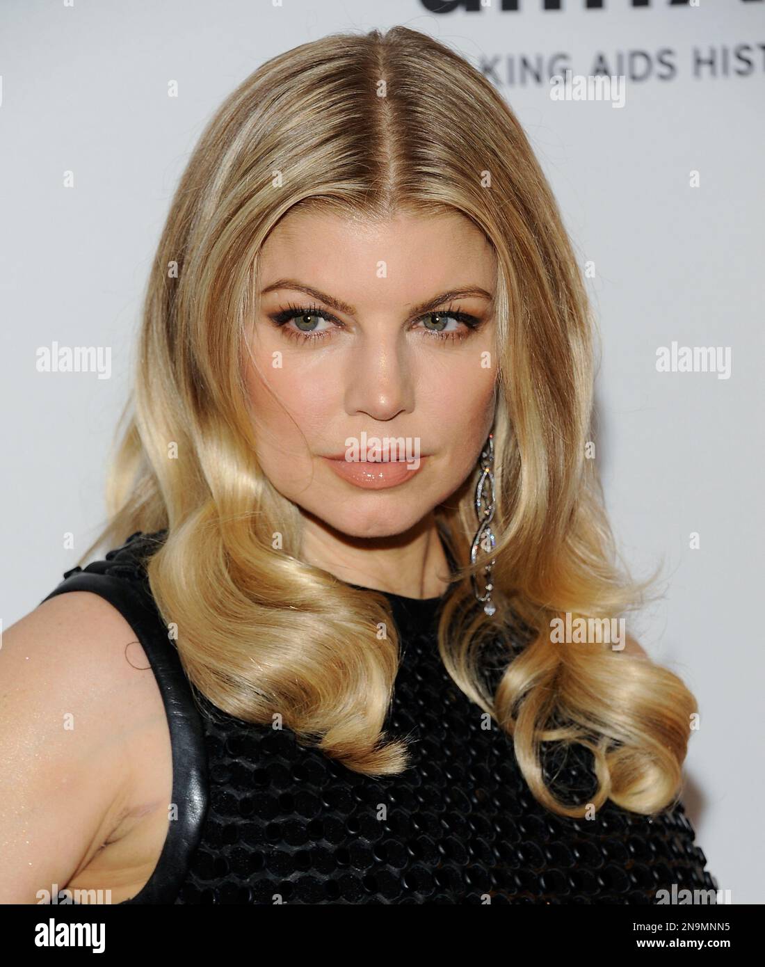 Singer Stacy "Fergie" Ferguson arrives at the amfAR Inspiration gala at ...