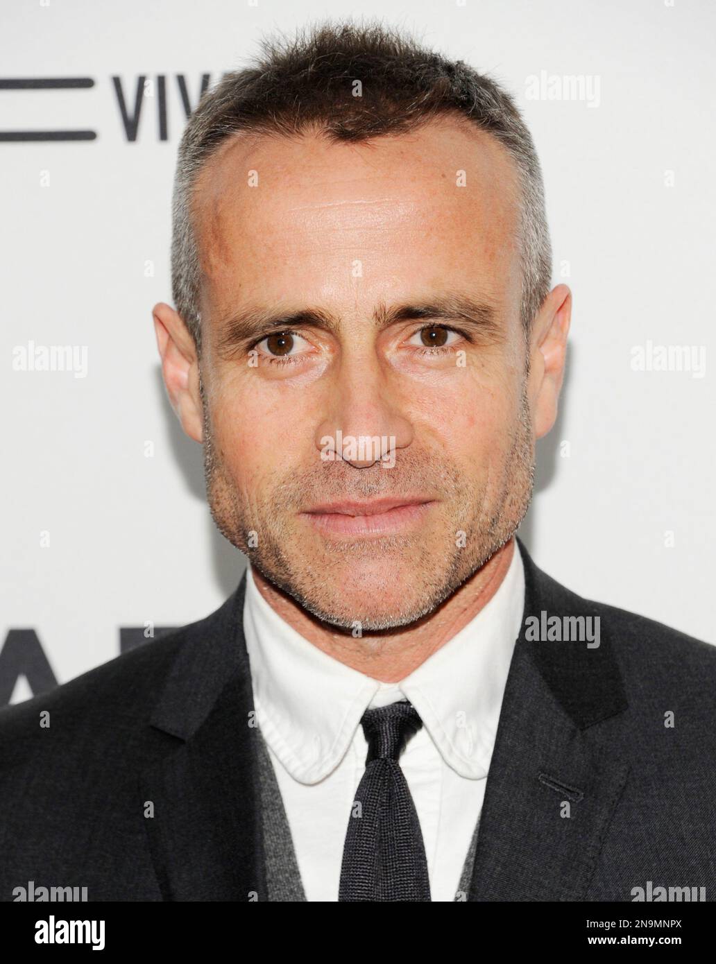 Designer Thom Browne arrives at the amfAR Inspiration gala at the New ...