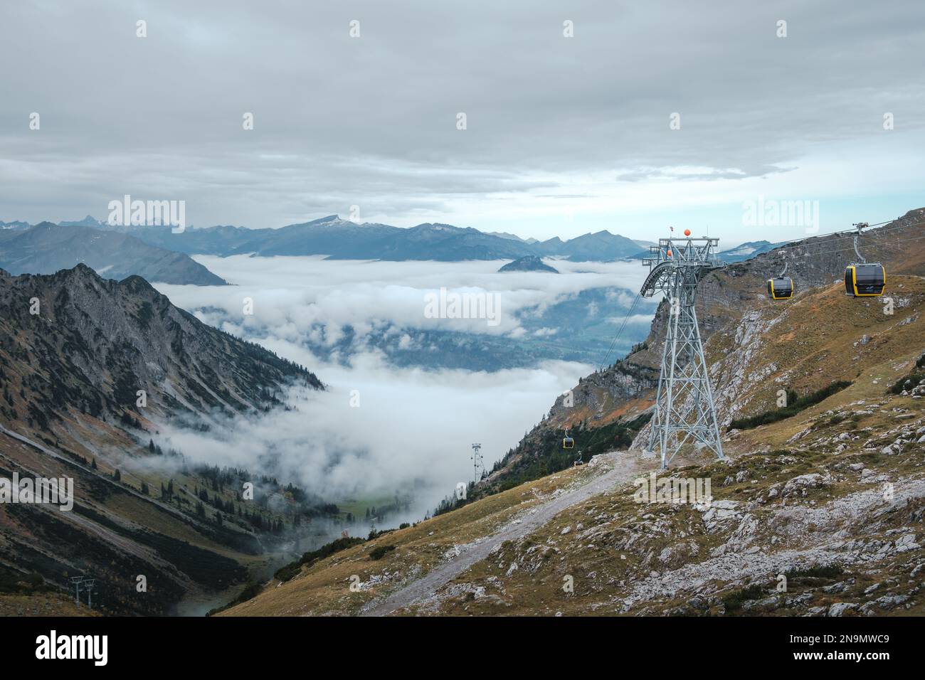 View to the new Nebelhorn Cable Car with big steel tower and mountain ...
