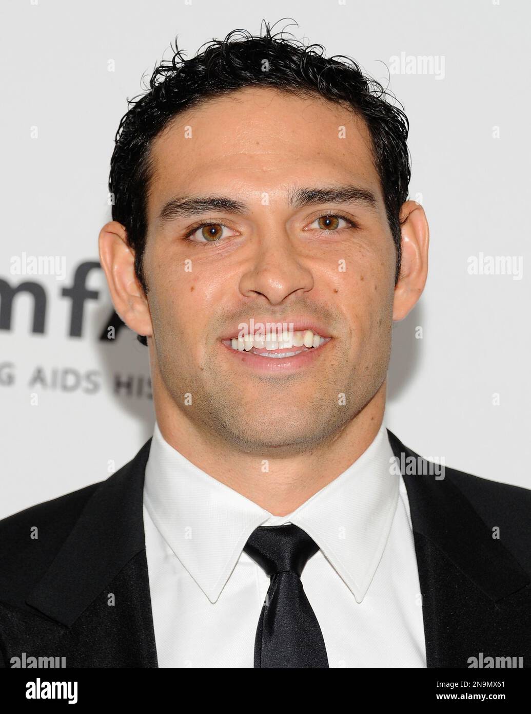 NFL Quarterback Mark Sanchez arrives at the amfAR Inspiration gala at ...