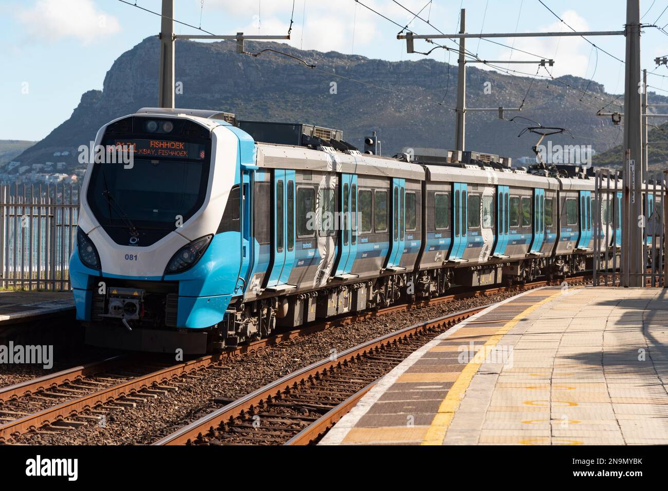 St James station, Western Cape, South Africa. 2023. A new blue train ...