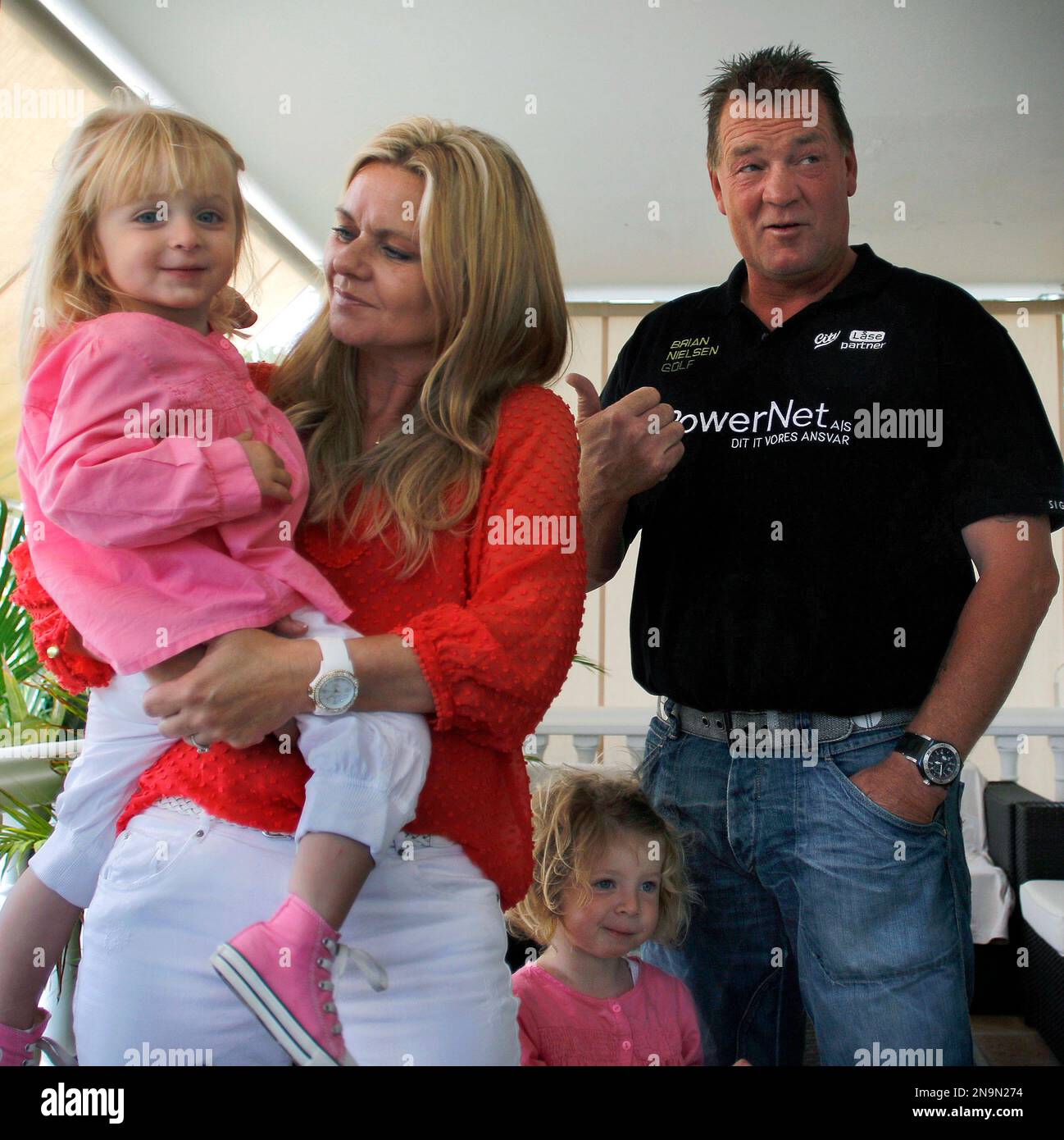 Danish boxer Brian Nielsen poses with his wife, Jeanette Buchard, and ...