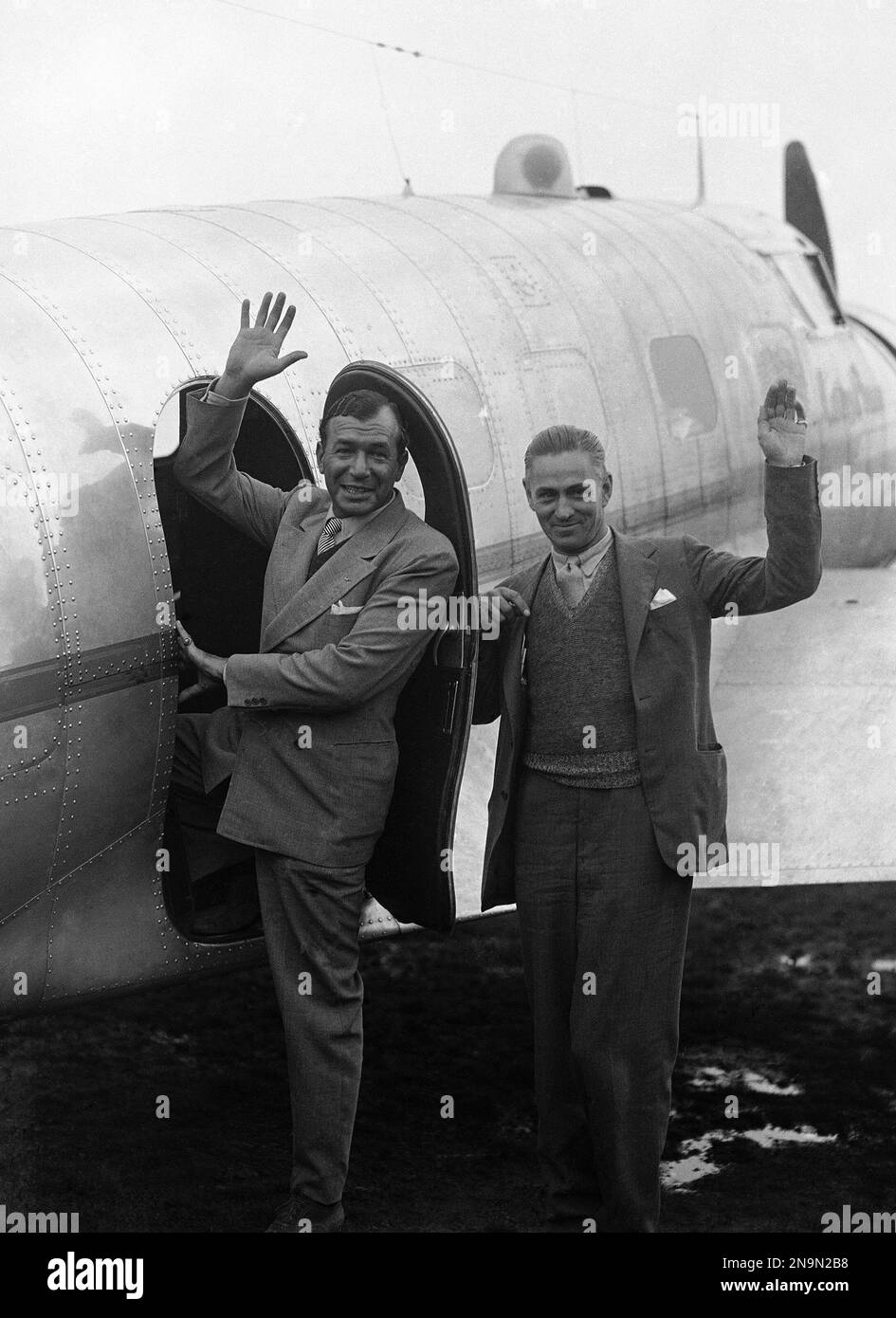 American millionaire actor and singer Harry Richman, left, and American aviator Dick Merrill ...