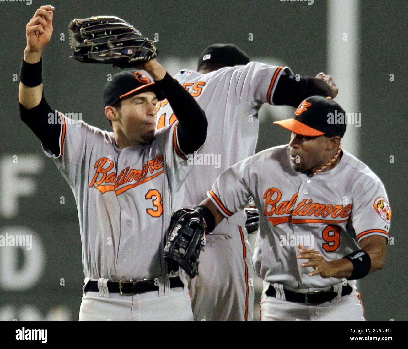 Baltimore Orioles outfielders Ryan Flaherty (3), Endy Chavez (9) and ...