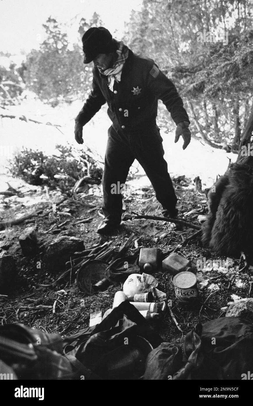 Sheriff Johnny France investigates the remains at the campsite of Don ...