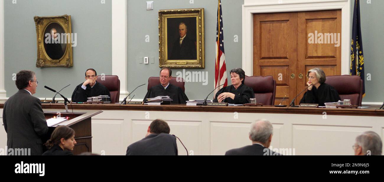 Martin Honigberg, far left, argues before the state Supreme Court ...
