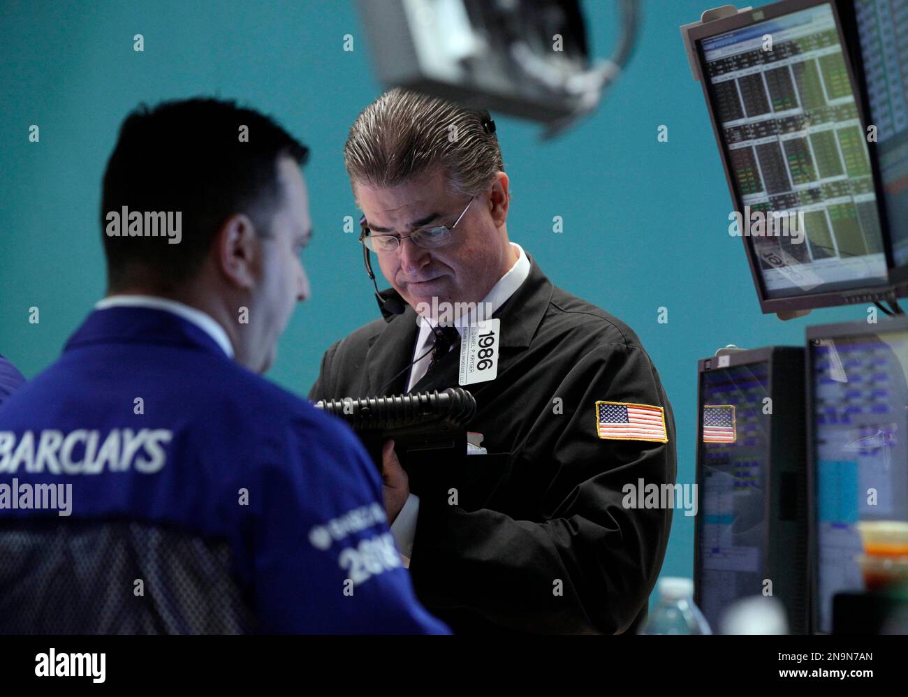 FILE- In this Monday, June 4, 2012, file photo, Trader Daniel Kryger ...