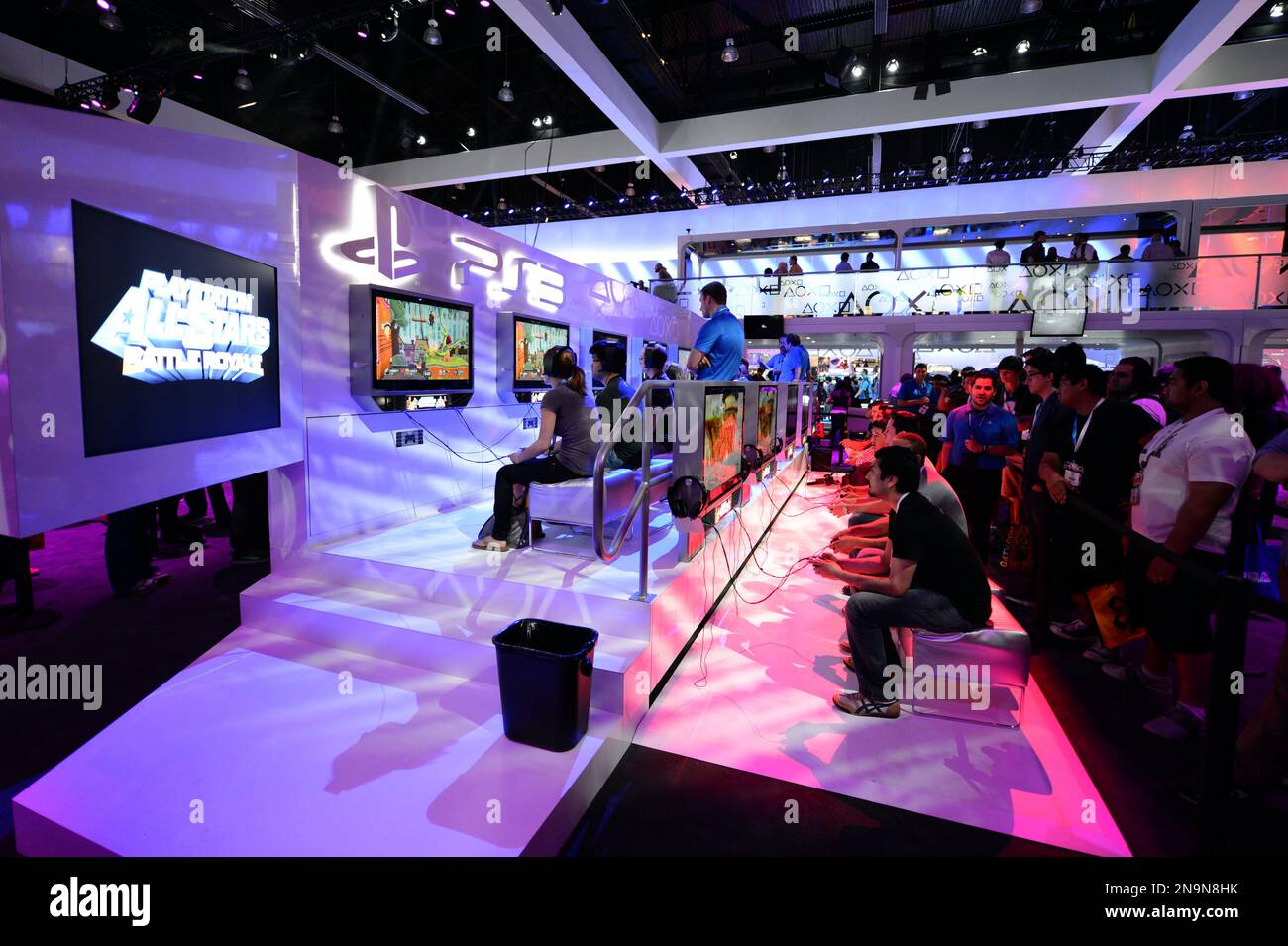 Guests visit the PlayStation booth at E3 on Tuesday, June 5, 2012 in ...
