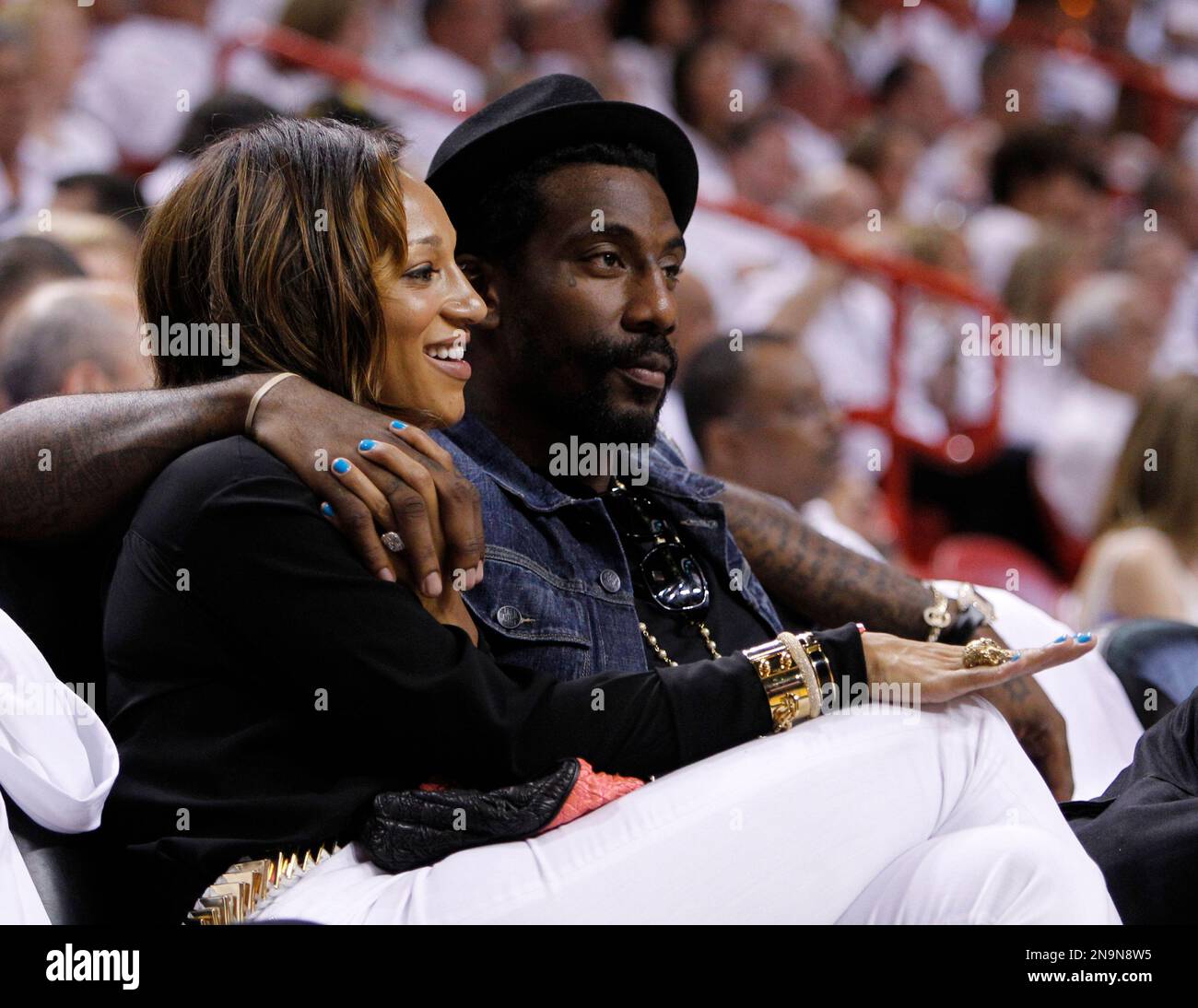 New York Knicks' Amare Stoudemire and his fiance Alexis Welch sit ...