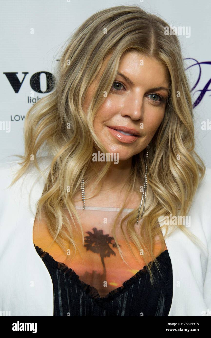 Fergie attends a party to celebrate her appearance on the July cover of ...