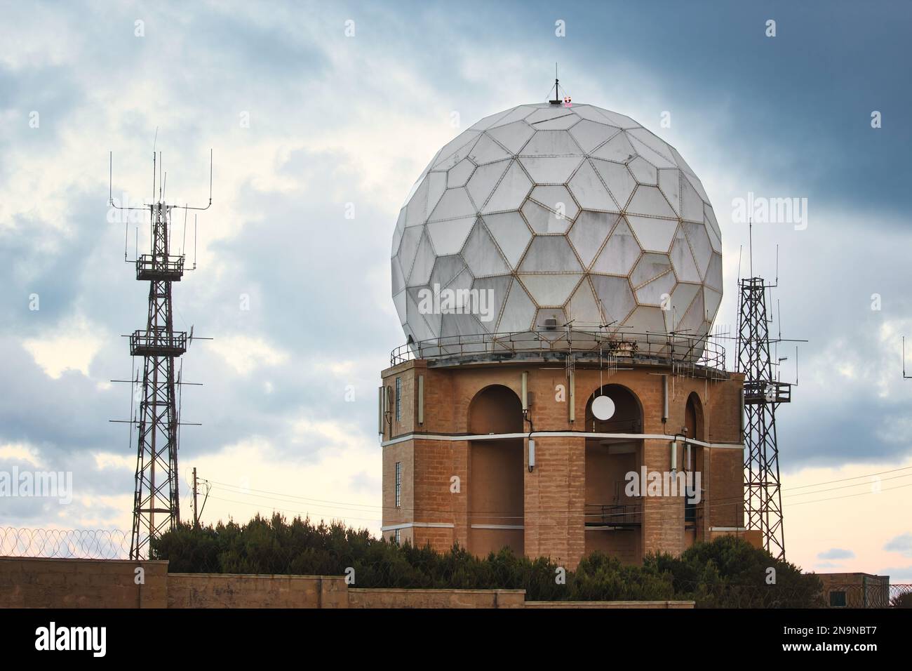 A white spherical aviation radar mounted on top of a tower Stock Photo ...
