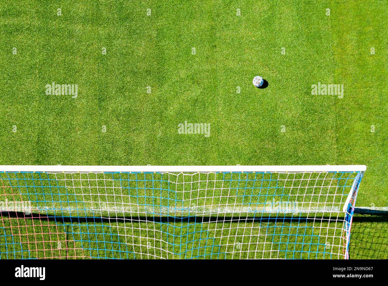 Soccer field with soccer goal and soccer ball from above Stock Photo ...