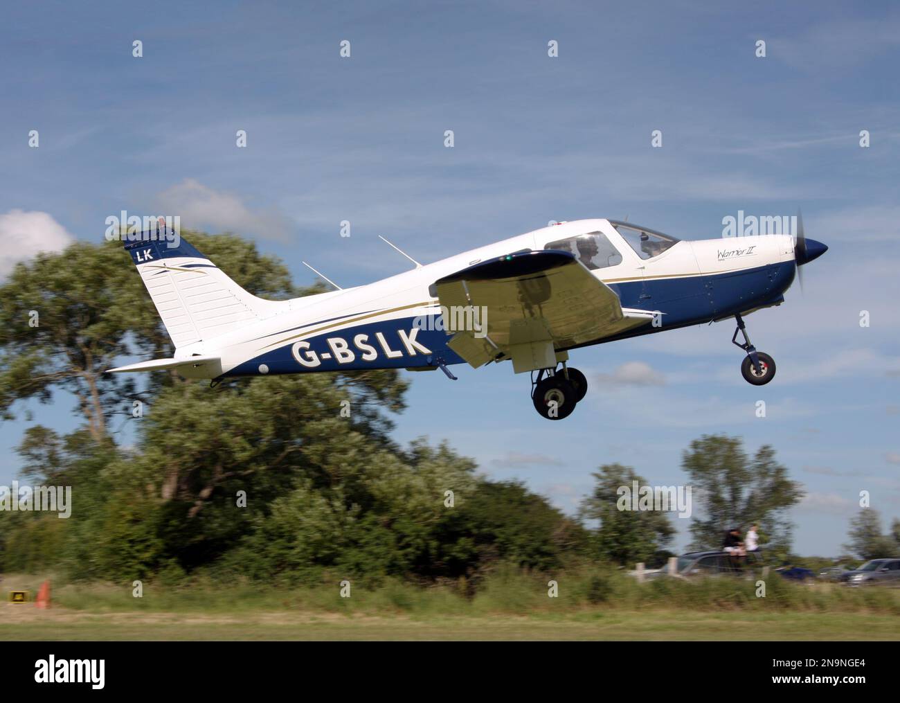 A Piper PA-28-161 Cherokee Warrior light aircraft departs a private ...