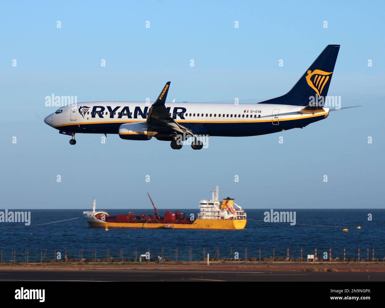 A Boeing 737-800 of Ryanair landing at Lanzarote Arrecife Airport with ...