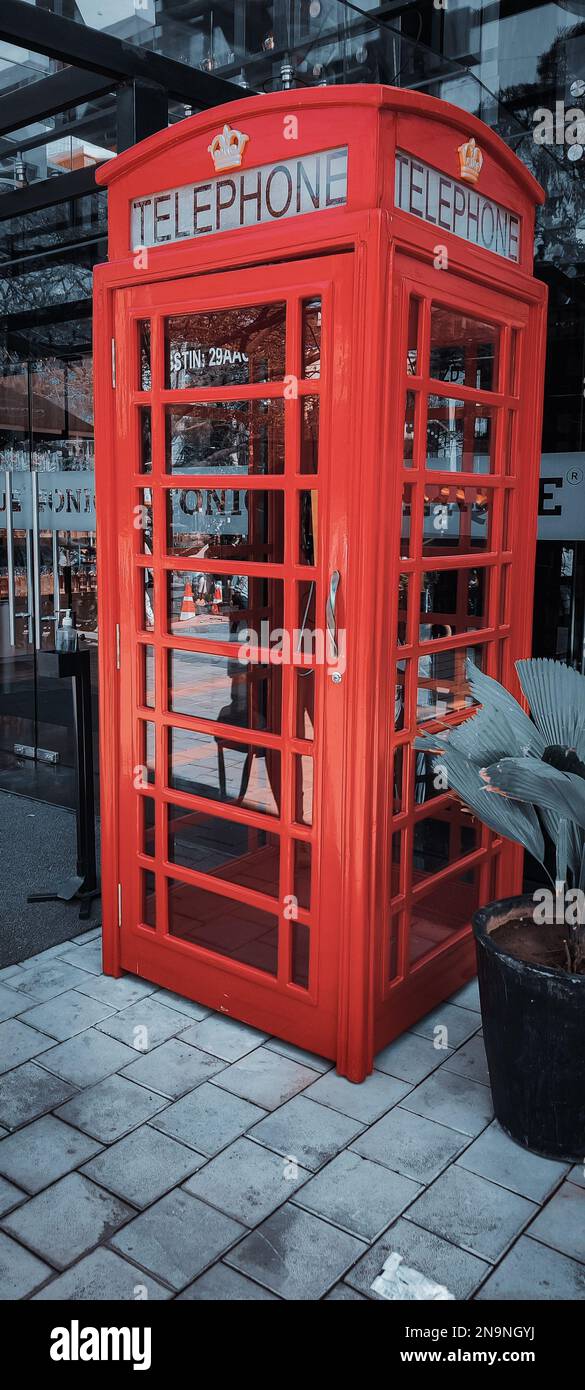 A traditional red telephone boot Stock Photo - Alamy