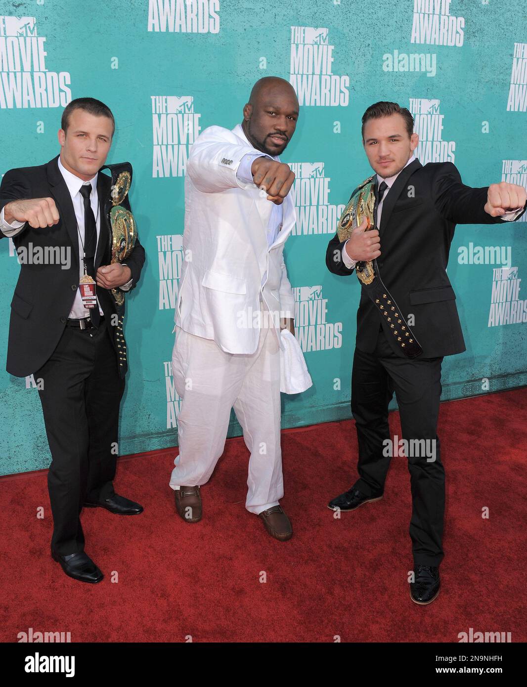 Pat Curran, left, King Mo and Michael Chandler arrive at the MTV Movie ...