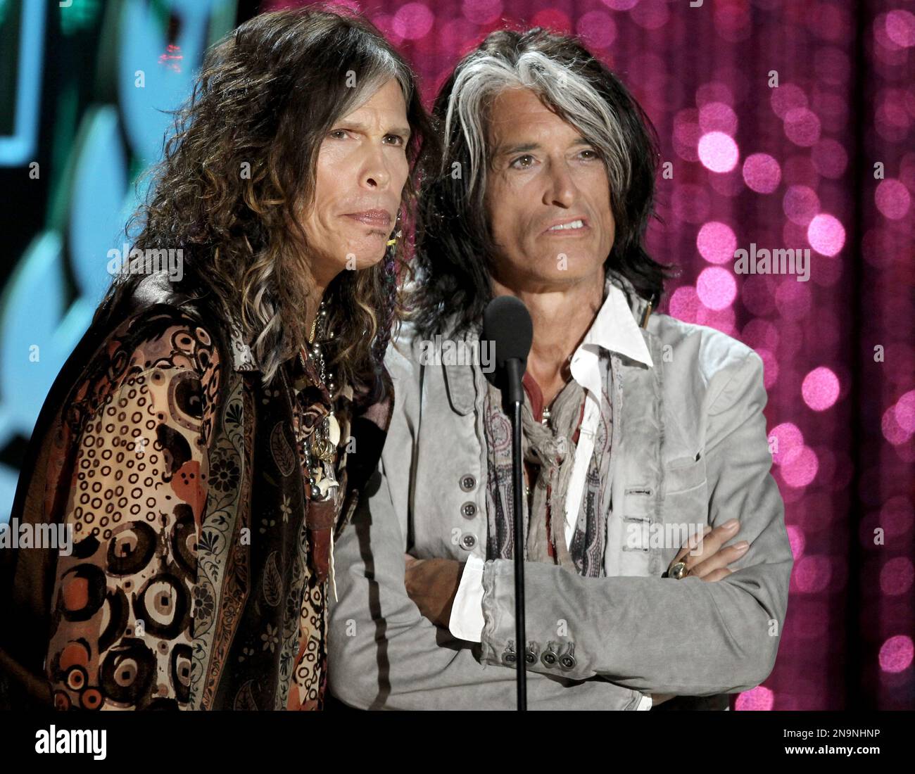 Steven Tyler, left, and Joe Perry present the MTV Generation award at ...