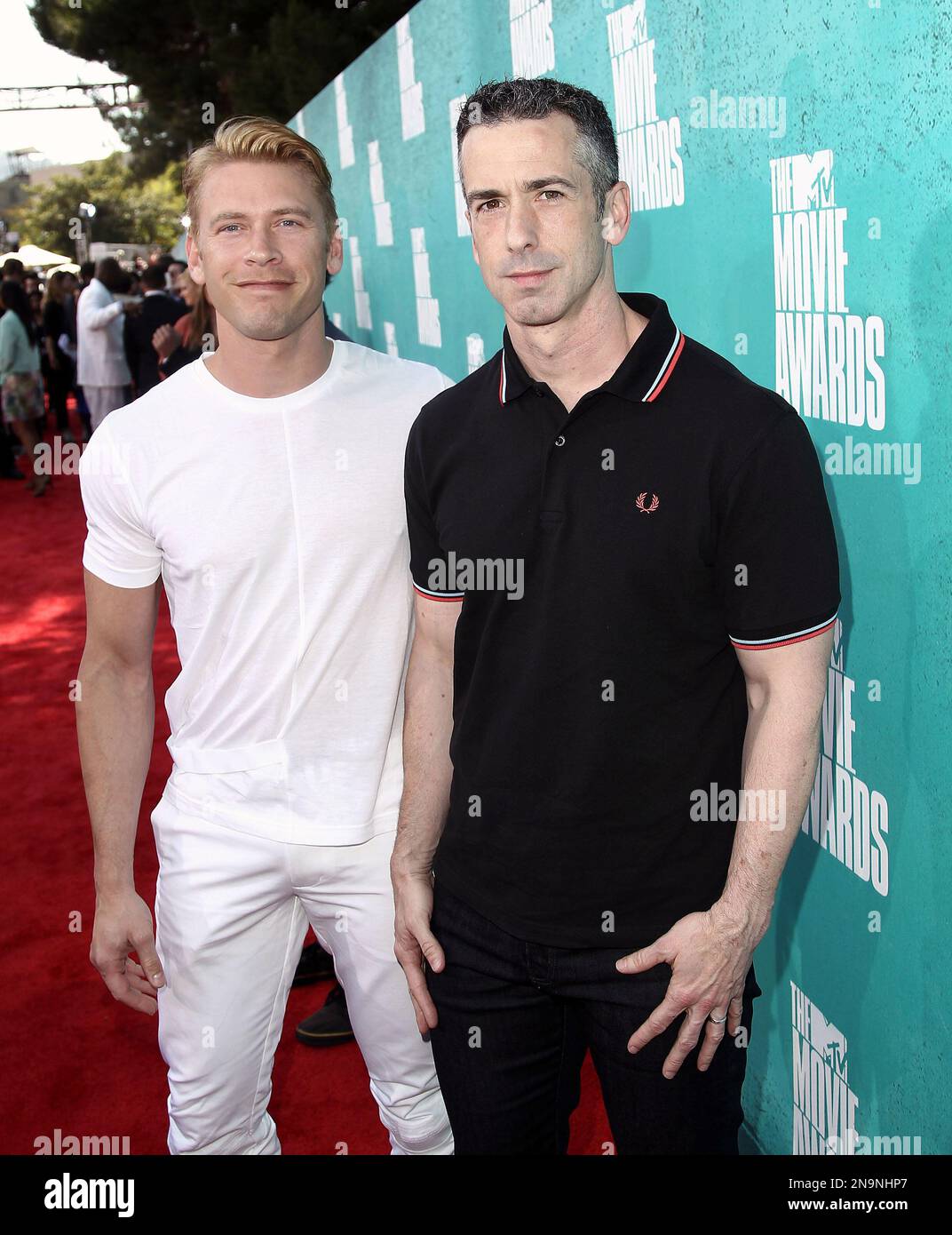Dan Savage, right, and Terry Miller arrive at the MTV Movie Awards on ...
