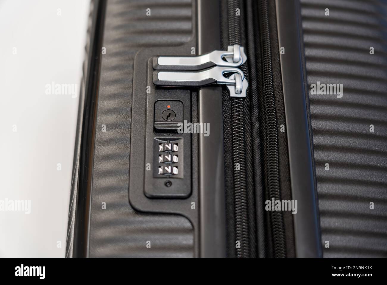 Vertical close-up view of a digital lock and zipper on a suitcase Stock ...