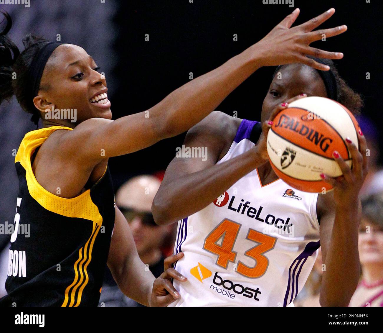 Tulsa Shock forward Glory Johnson pressures Phoenix Mercury's Nakia ...