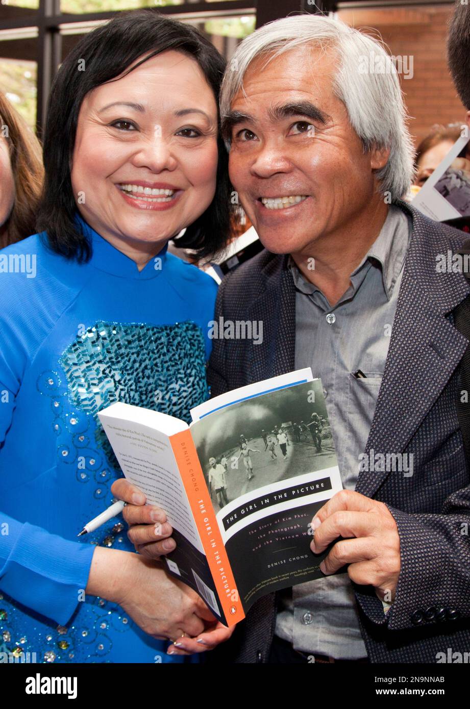 Kim Phuc, left, and Associated Press staff photographer Nick Ut smile ...