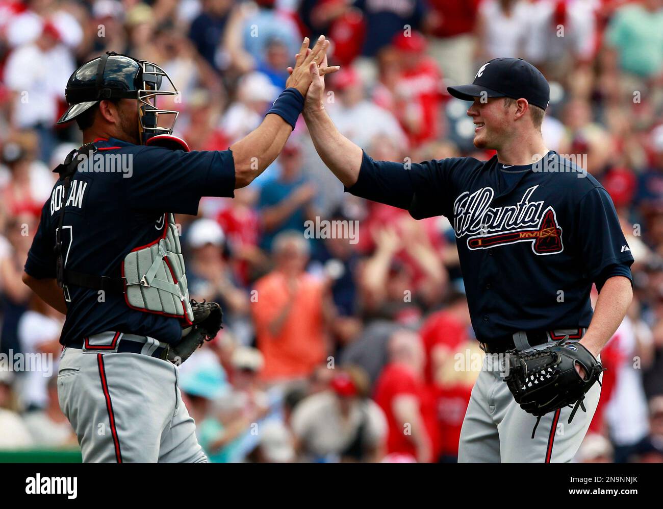 Atlanta Braves catcher David Ross, left, reacts with relief pitcher ...
