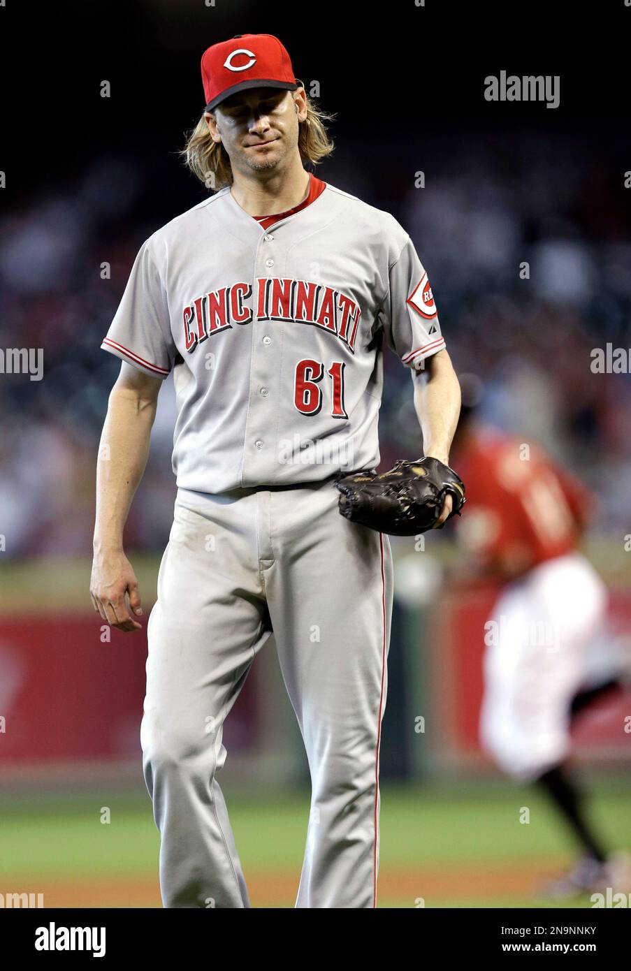 Cincinnati Reds' Bronson Arroyo (61) reacts after giving up a two-run ...