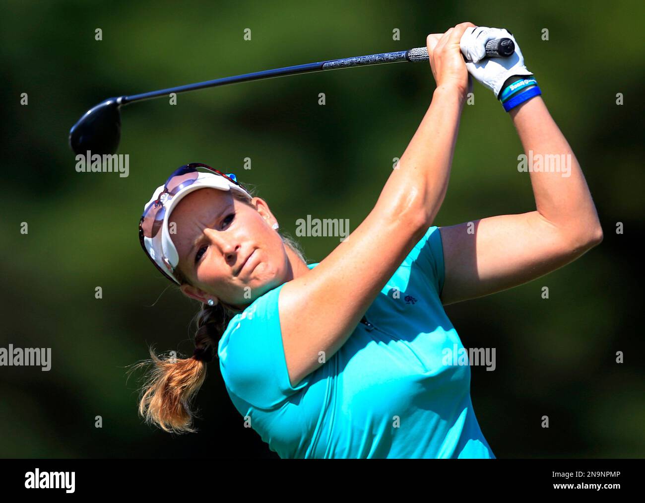Anna Grzebien hits a tee shot on the fourth hole during the final round ...