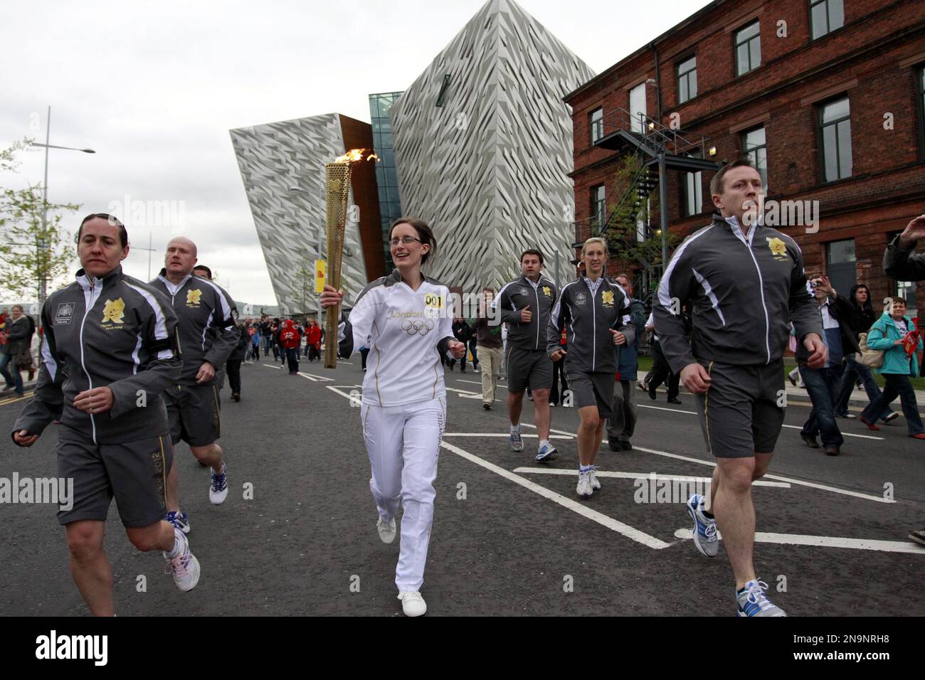 Karen Marshall, the first torch bearer from Northern Ireland, carries ...