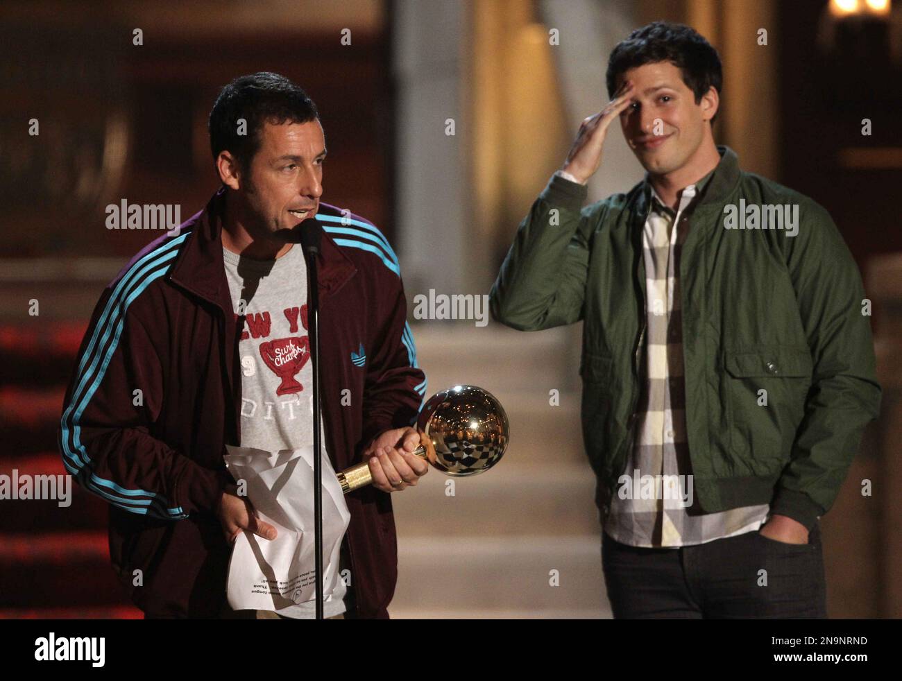 Andy Samberg, right, presents the brass balls award to Adam Sandler ...