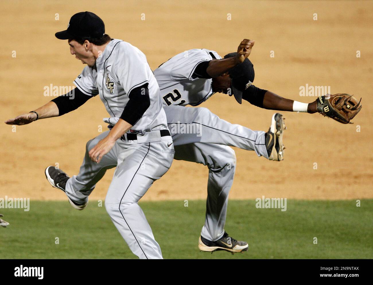 Central Florida relief pitcher Joe Rogers, left, and shortstop Darnell ...