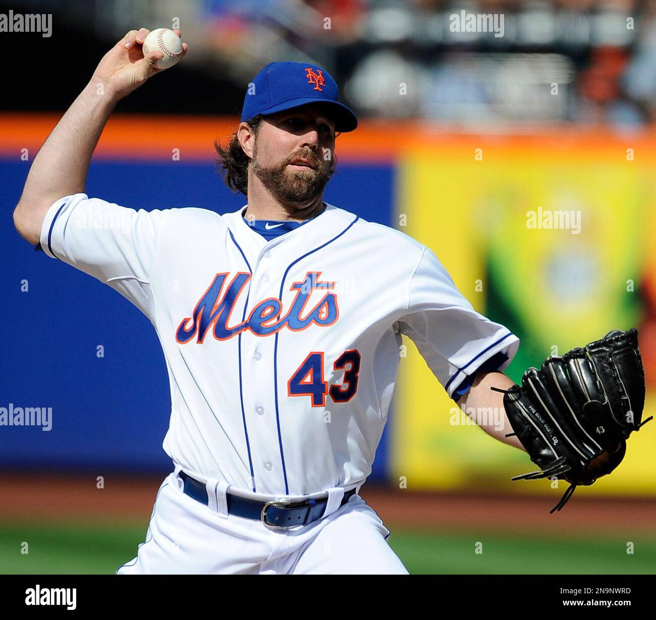 New York Mets starting pitcher R.A. Dickey (43) throws against the St ...