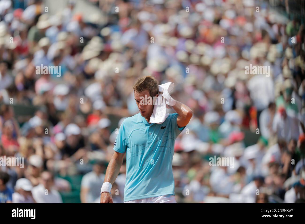 Richard Gasquet of France wipes the sweat of his head in his third ...