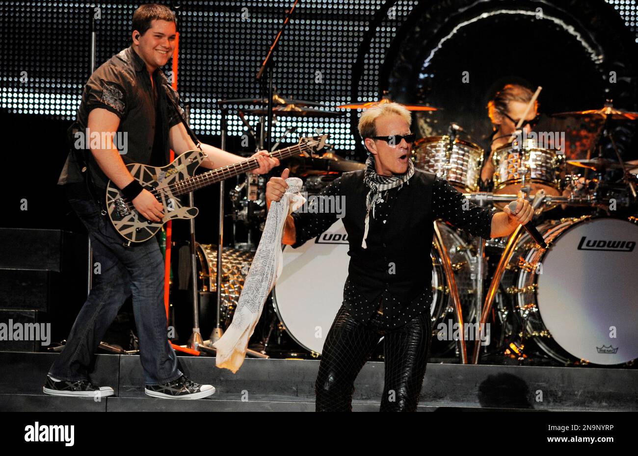 David Lee Roth of Van Halen performs as fellow band member Wolfgang Van ...