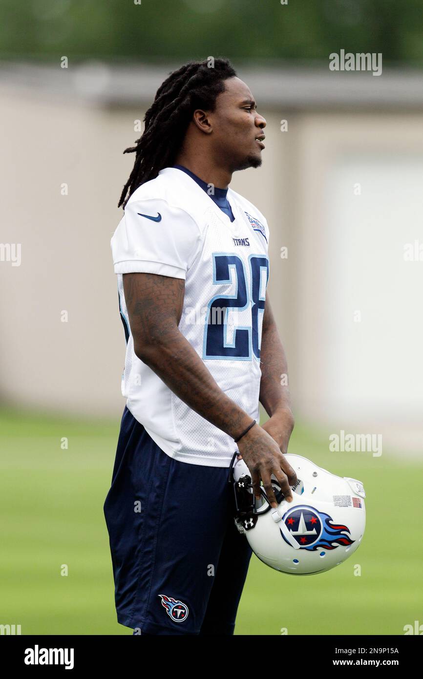 Tennessee Titans running back Chris Johnson talks with a teammate ...