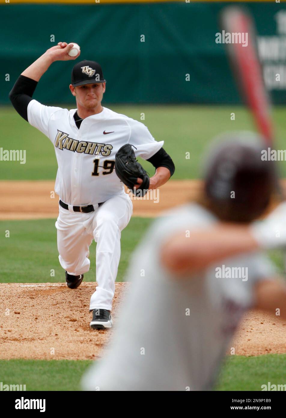 UCF's Ben Lively delivers a pitch during the first inning of an NCAA ...
