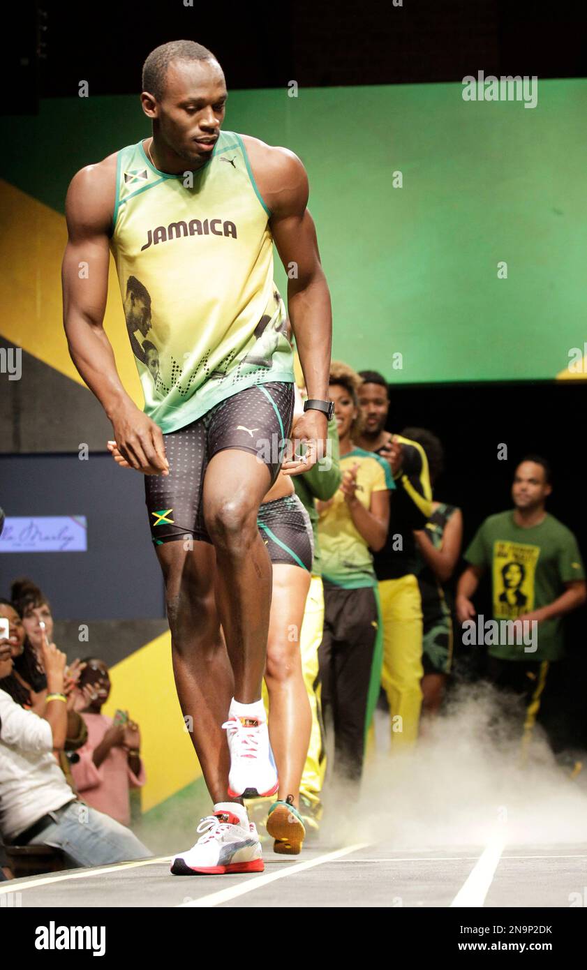 Jamaica's sprinter Usain Bolt models a Jamaica Olympic kit designed by ...